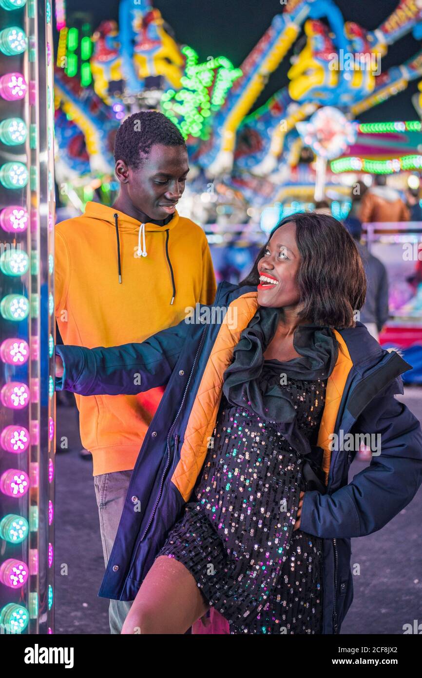 Cheerful young couple playing claw hi-res stock photography and images ...