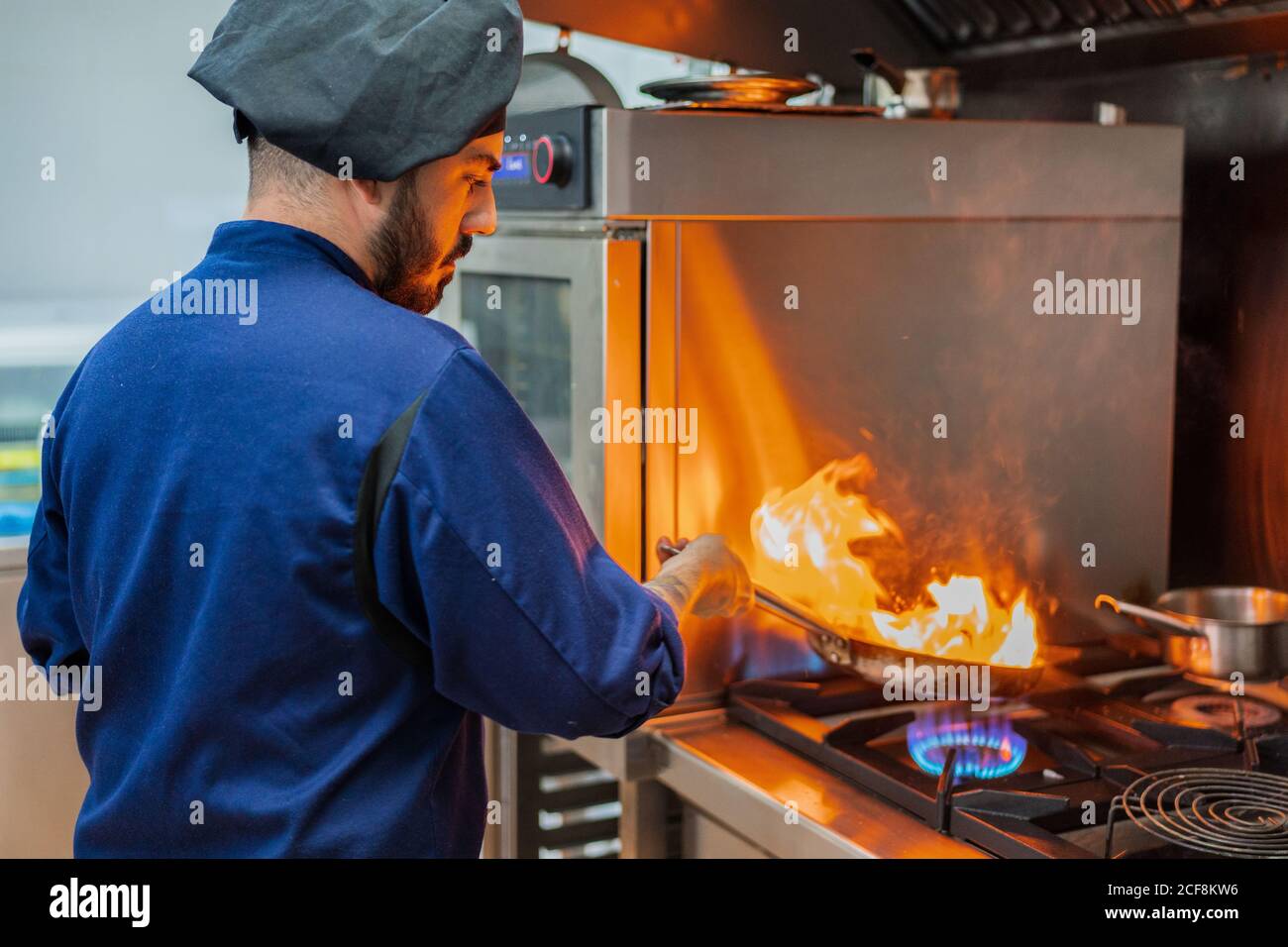 Chef cooking flame hi-res stock photography and images - Alamy