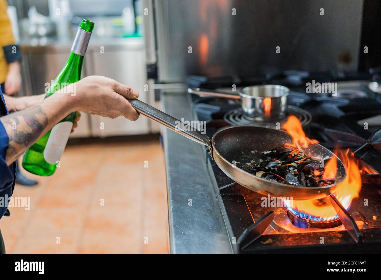 Chef cooking flame hi-res stock photography and images - Alamy