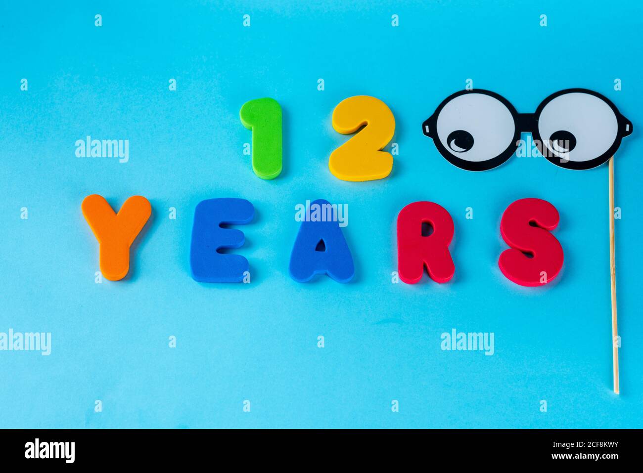 12 years old celebrating classic logo, Masquerade Masks on Stick ...