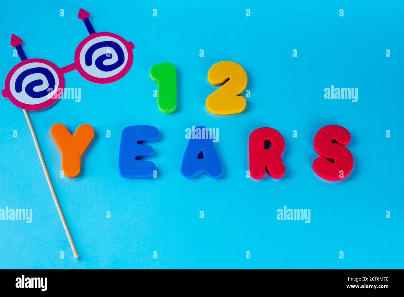 12 years old celebrating classic logo. Colored happy anniversary 12 th ...