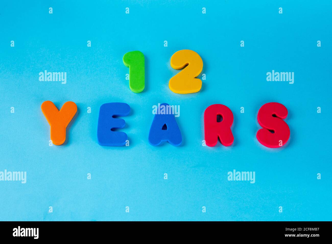 12 years old celebrating classic logo. Colored happy anniversary 12 th ...