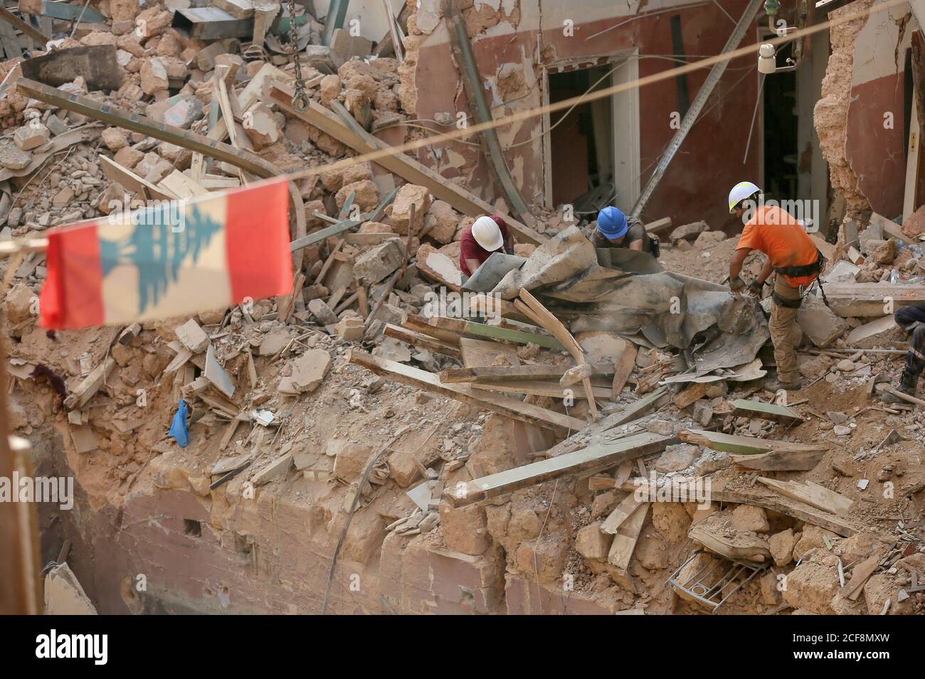 Beirut, Lebanon. 04th Sep, 2020. Rescue workers remove rubble of a ...