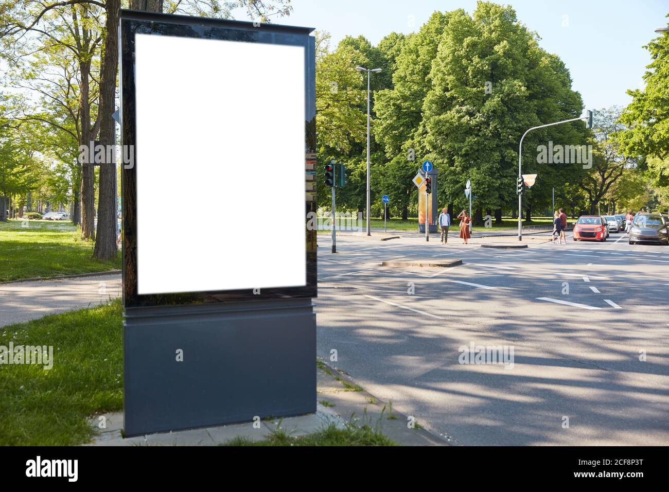 City Light Poster Mock-Up Template at the intersection of a street ...