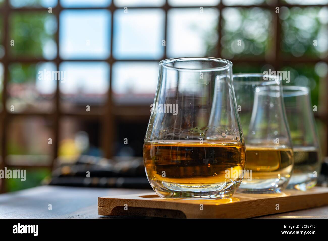 Tasting of different Scotch whisky drinks in traditional old British ...