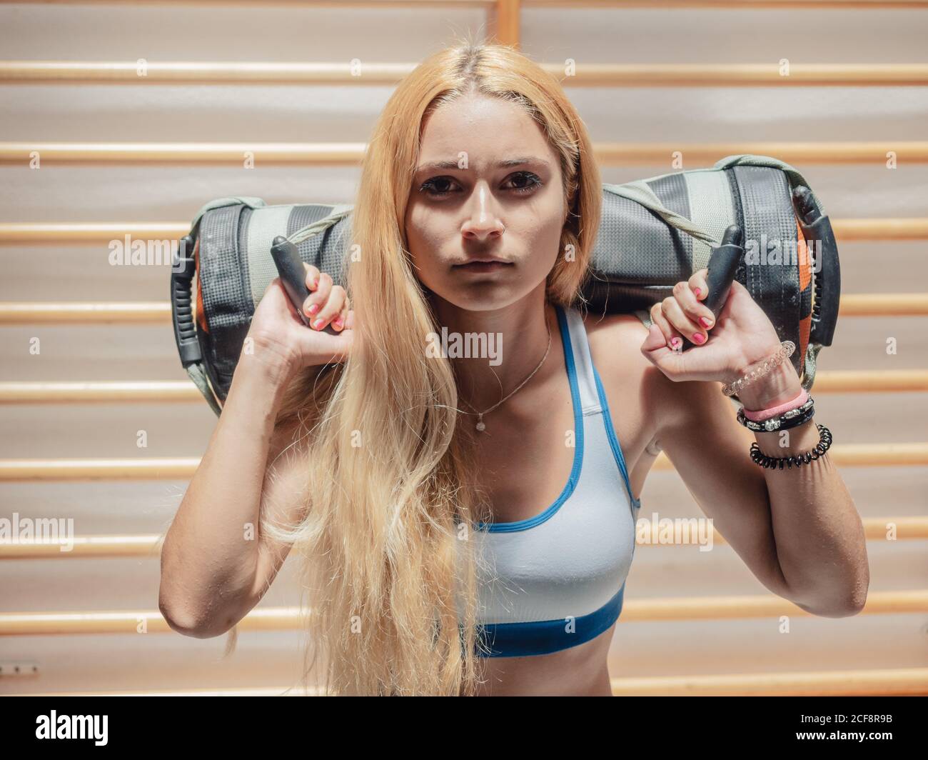 Lady with heavy bags hi-res stock photography and images - Alamy