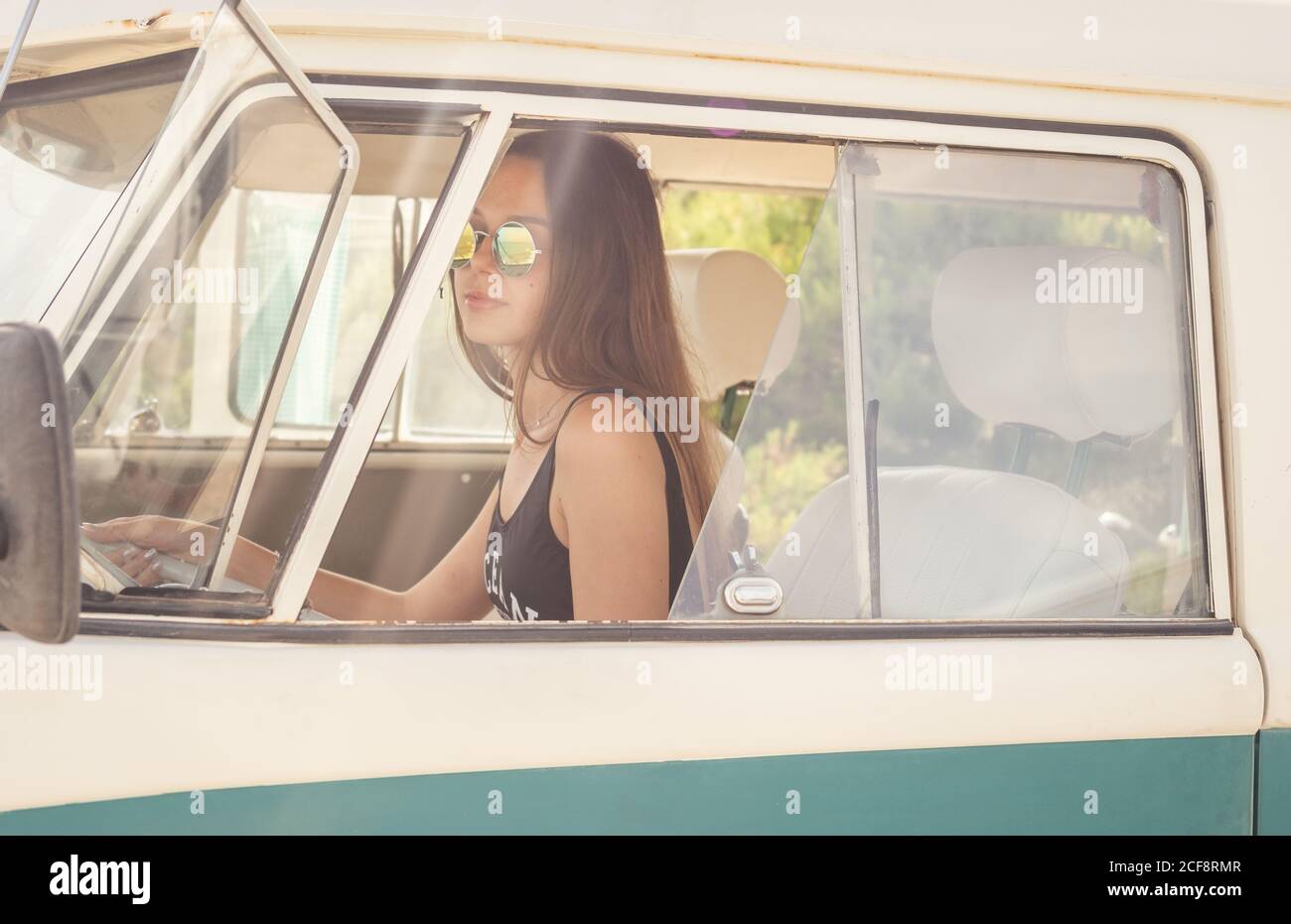 Car front view woman sitting hi-res stock photography and images - Alamy