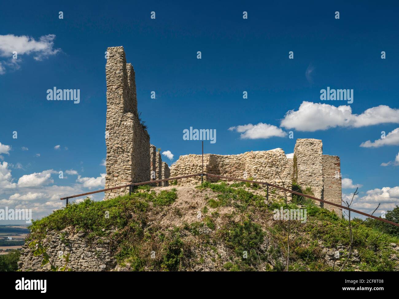 Ruins of Starojicinsky hrad, medieval castle on hill above village of ...