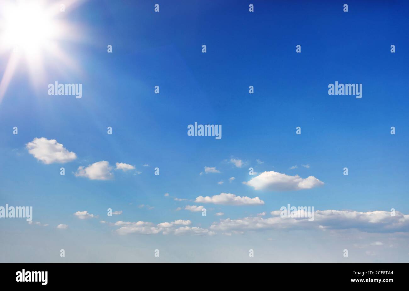 Blue sky with small white clouds and sunshine in summer on day Stock ...