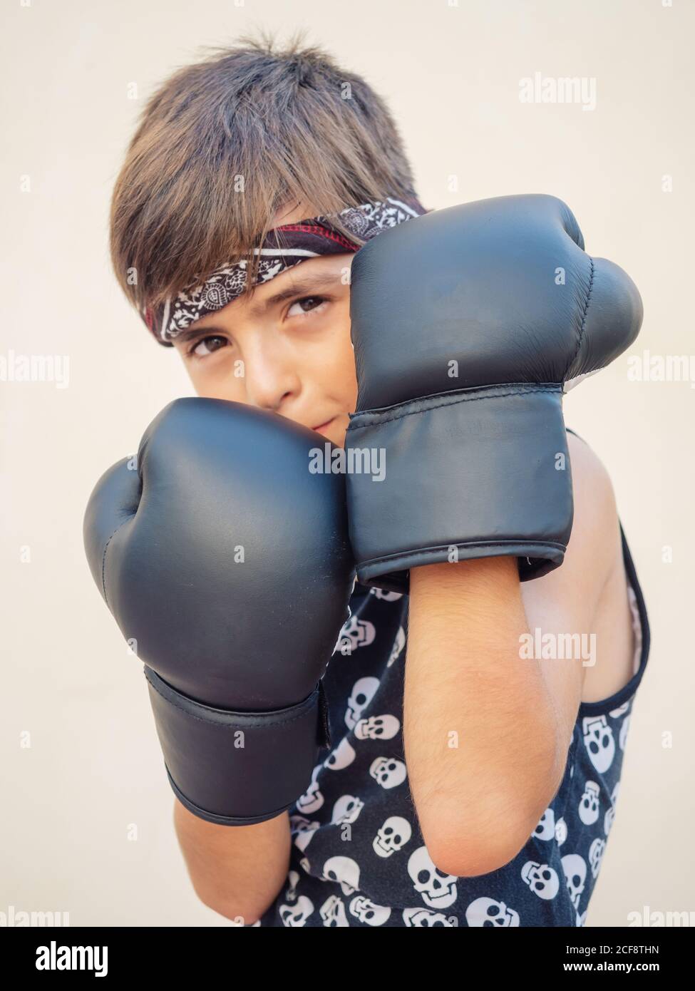 Boy with boxing gloves hi-res stock photography and images - Alamy