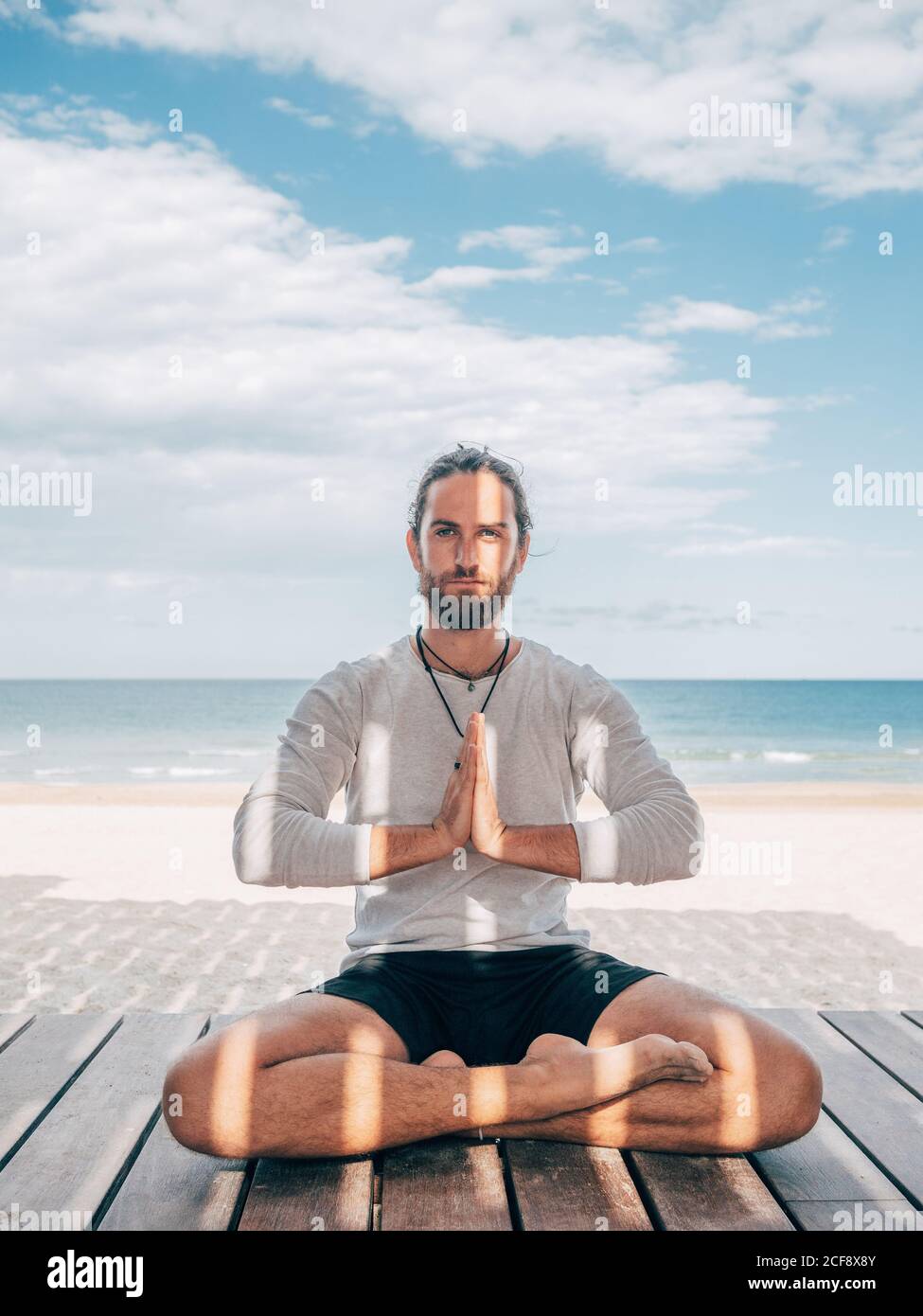 Male meditating hi-res stock photography and images - Alamy