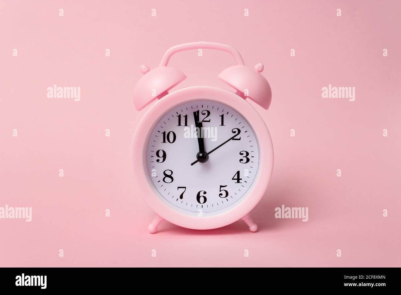 Pastel pink alarm clocks hi-res stock photography and images - Alamy