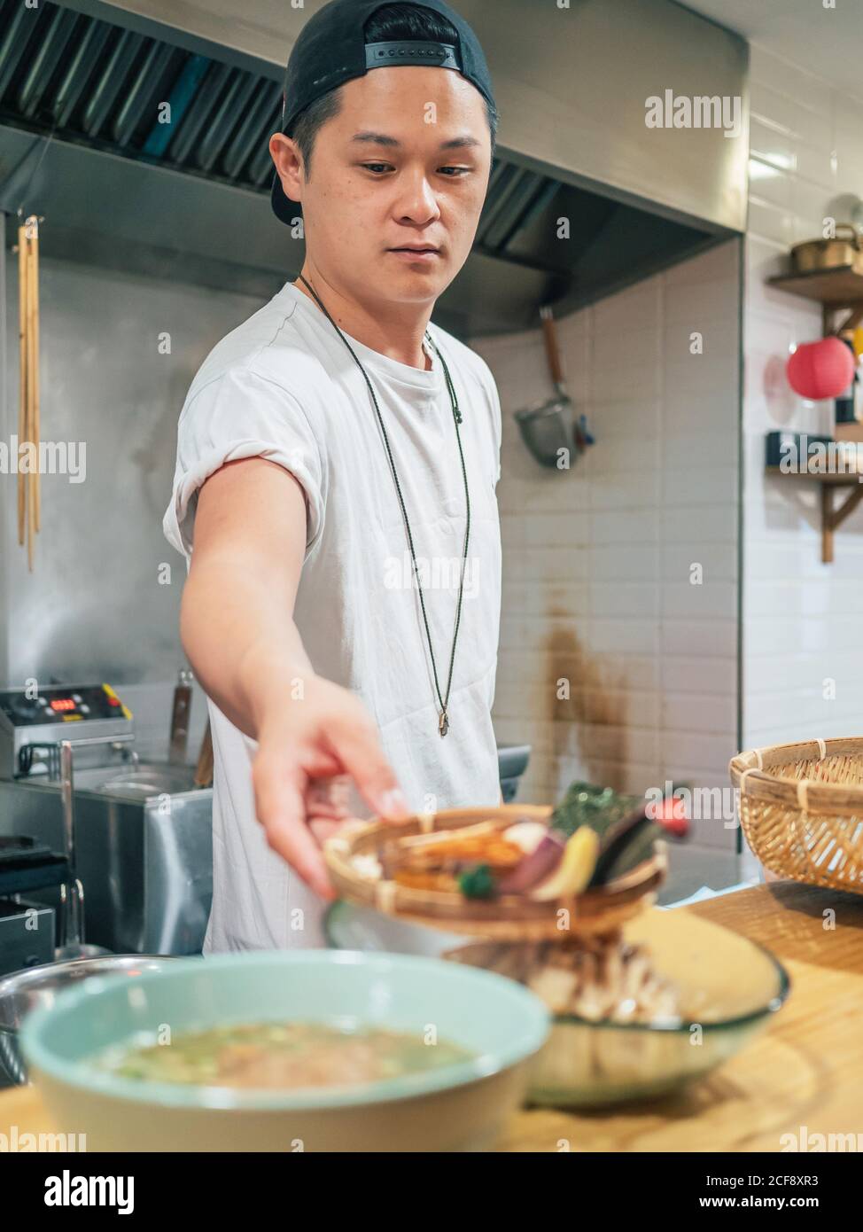 Asian Guy Cooking Asian Young Man Is Cooking Stock Photo. Image Of