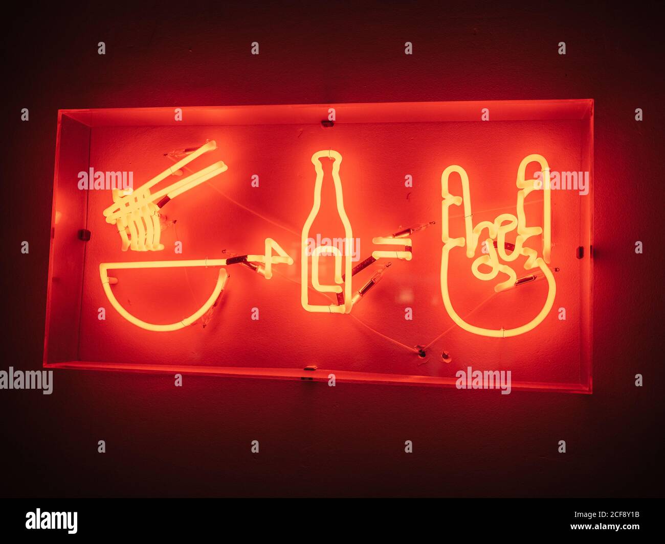 Illuminated signboard of Asian restaurant offering food and drinks ...