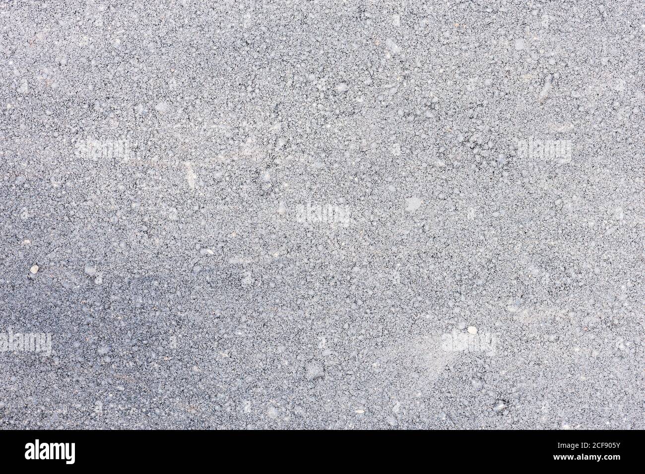 New dirty asphalt road surface after construction time Stock Photo - Alamy