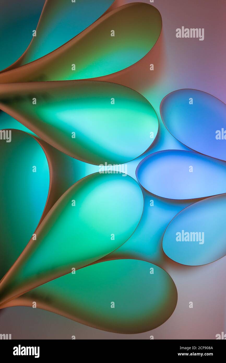 abstract multicolored green and blue background with glowing bubbles of ...