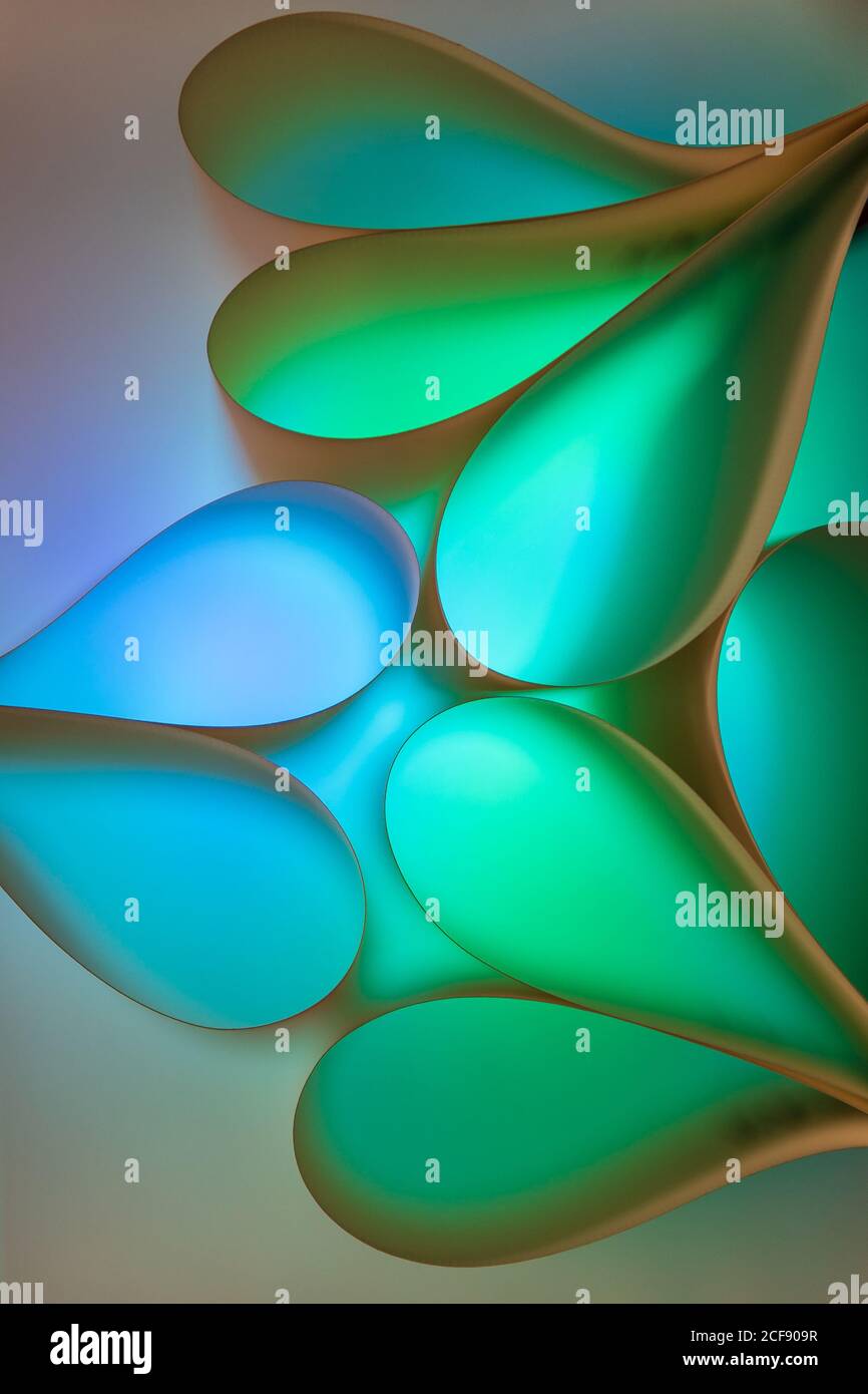abstract multicolored green and blue background with glowing bubbles of ...