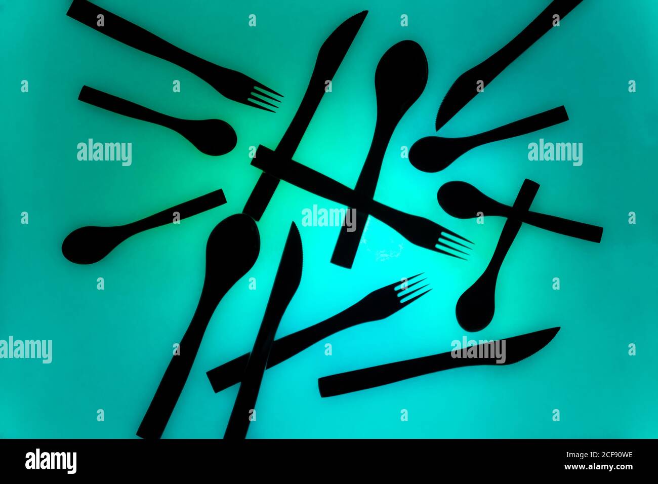 Set of cutlery on colorful background Stock Photo - Alamy