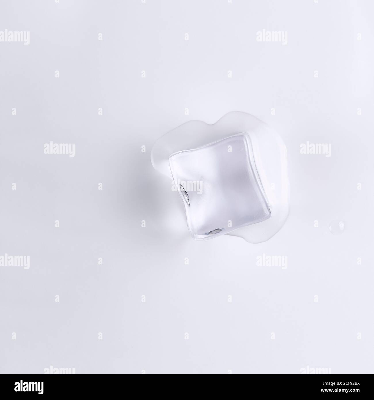 Ice cube isolated on white background. Single ice cube melting. Deep ...
