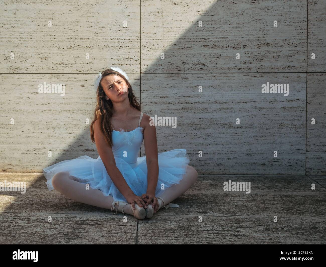Ballerina sitting on floor hi-res stock photography and images - Alamy