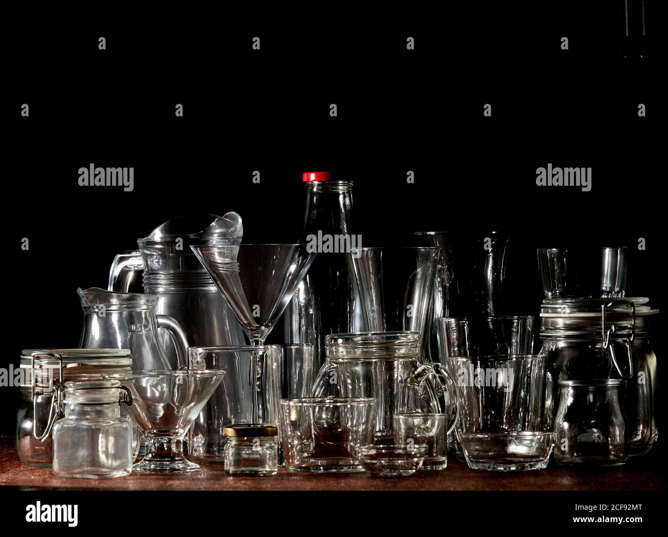 Group of empty transparent glass jars, cups and containers Stock Photo ...