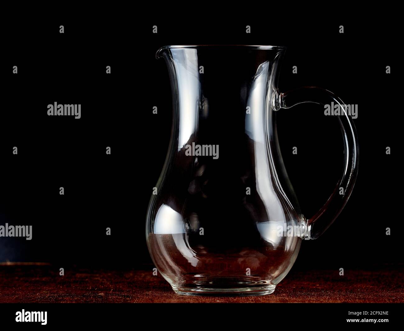 The contours of and empty glass jug Stock Photo - Alamy