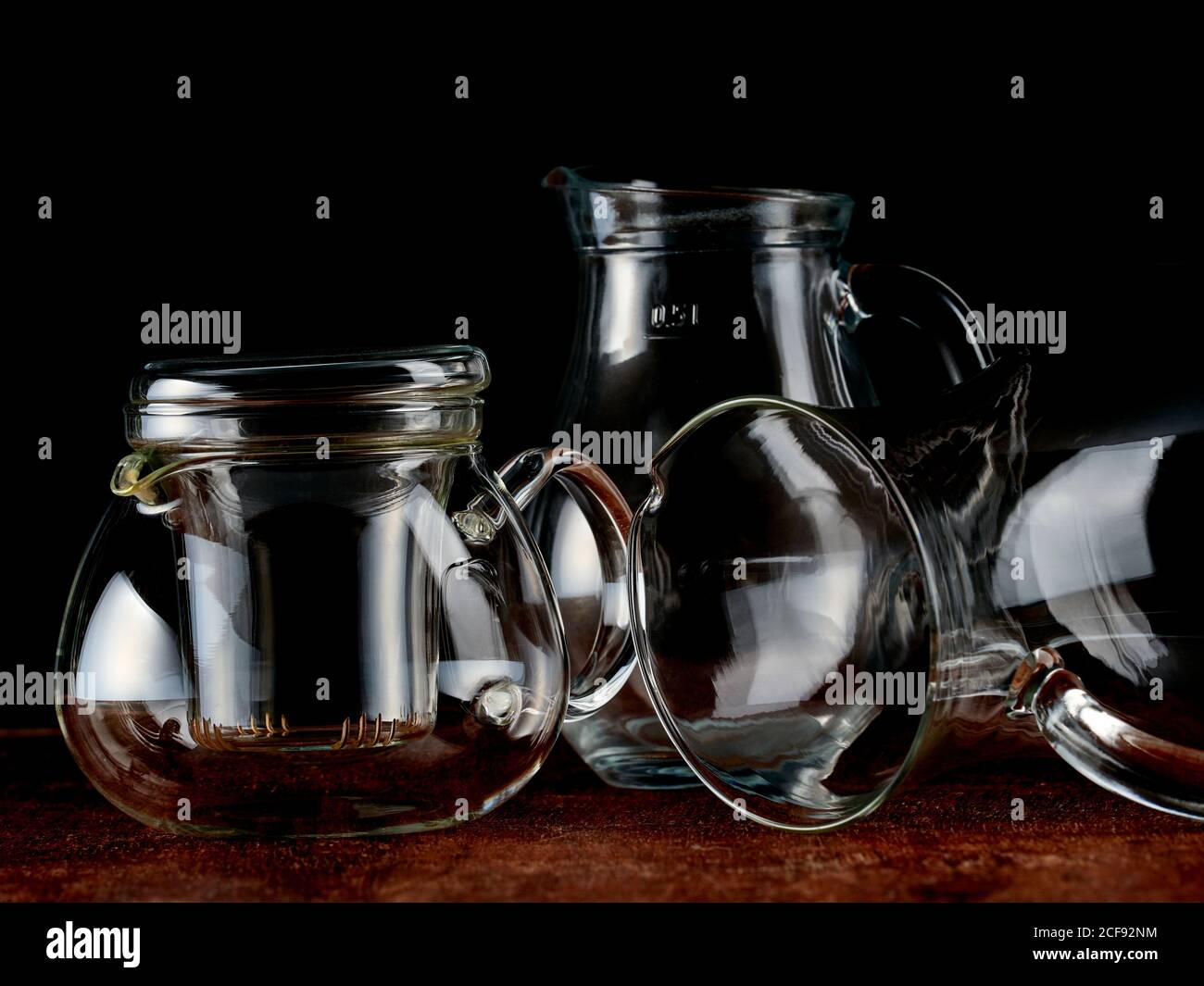 Group of transparent glass jars to contain liquids Stock Photo - Alamy