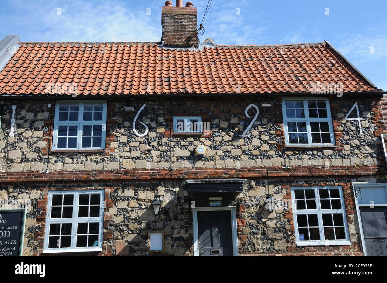 The Dolphin, Thetford, Norfolk, bears the date 1694 Stock Photo - Alamy