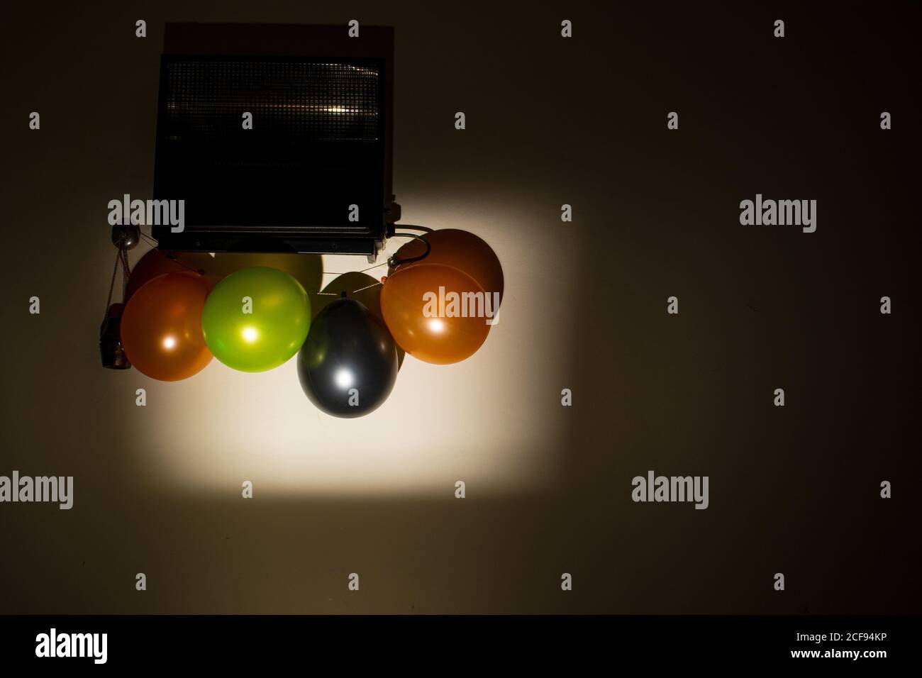Colorful balloons hanging in a room Stock Photo - Alamy