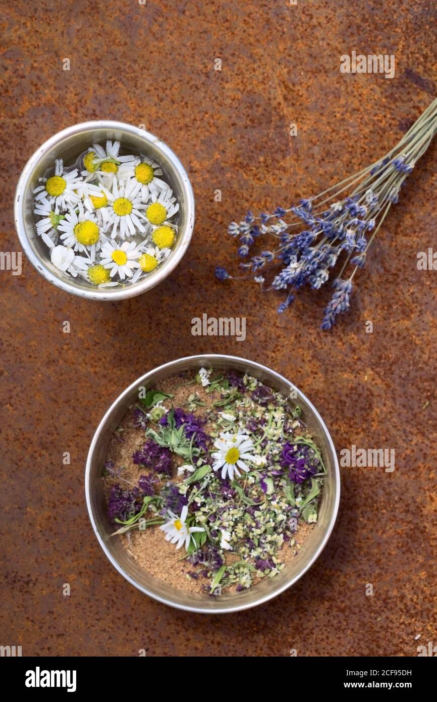 scrub of natural ingredients in indian bowl, vessel with water ...