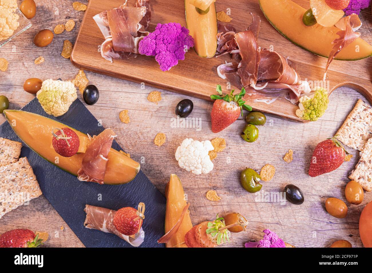 Arranged ingredients and snack with ham Stock Photo - Alamy