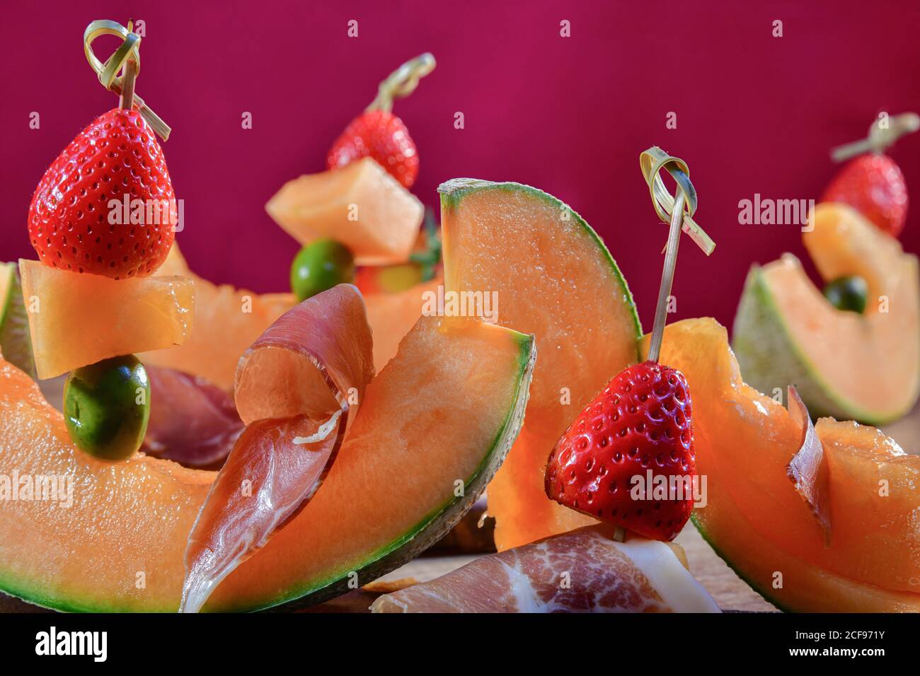 Arranged ingredients and snack with ham Stock Photo - Alamy