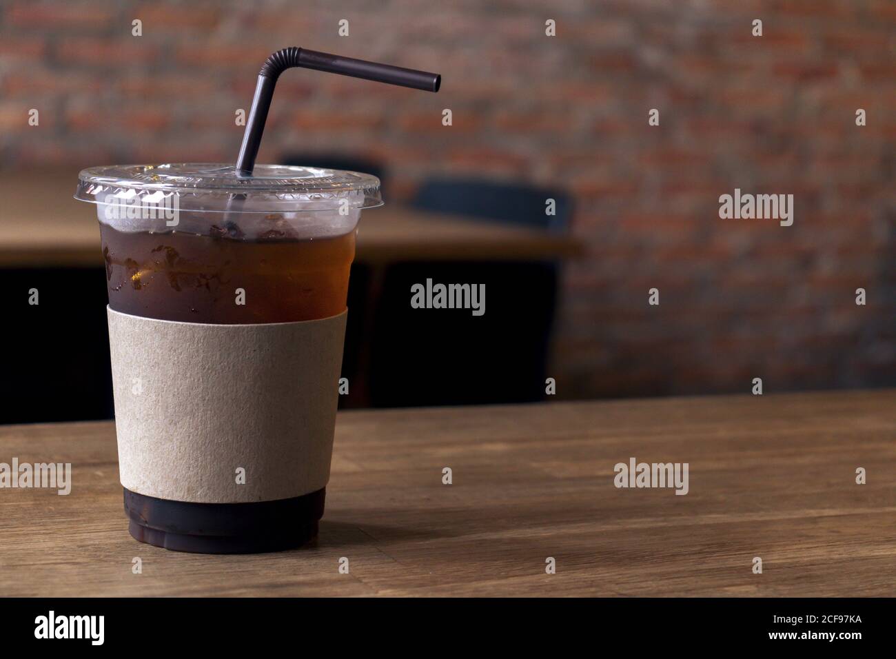 Closeup shot of a takeaway iced tea on a table Stock Photo - Alamy