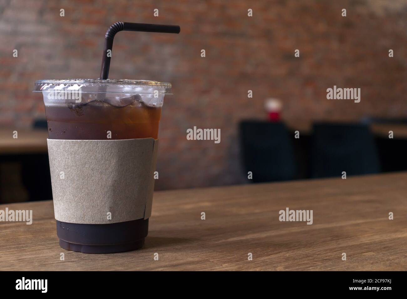 Closeup shot of a takeaway iced tea on a table Stock Photo - Alamy