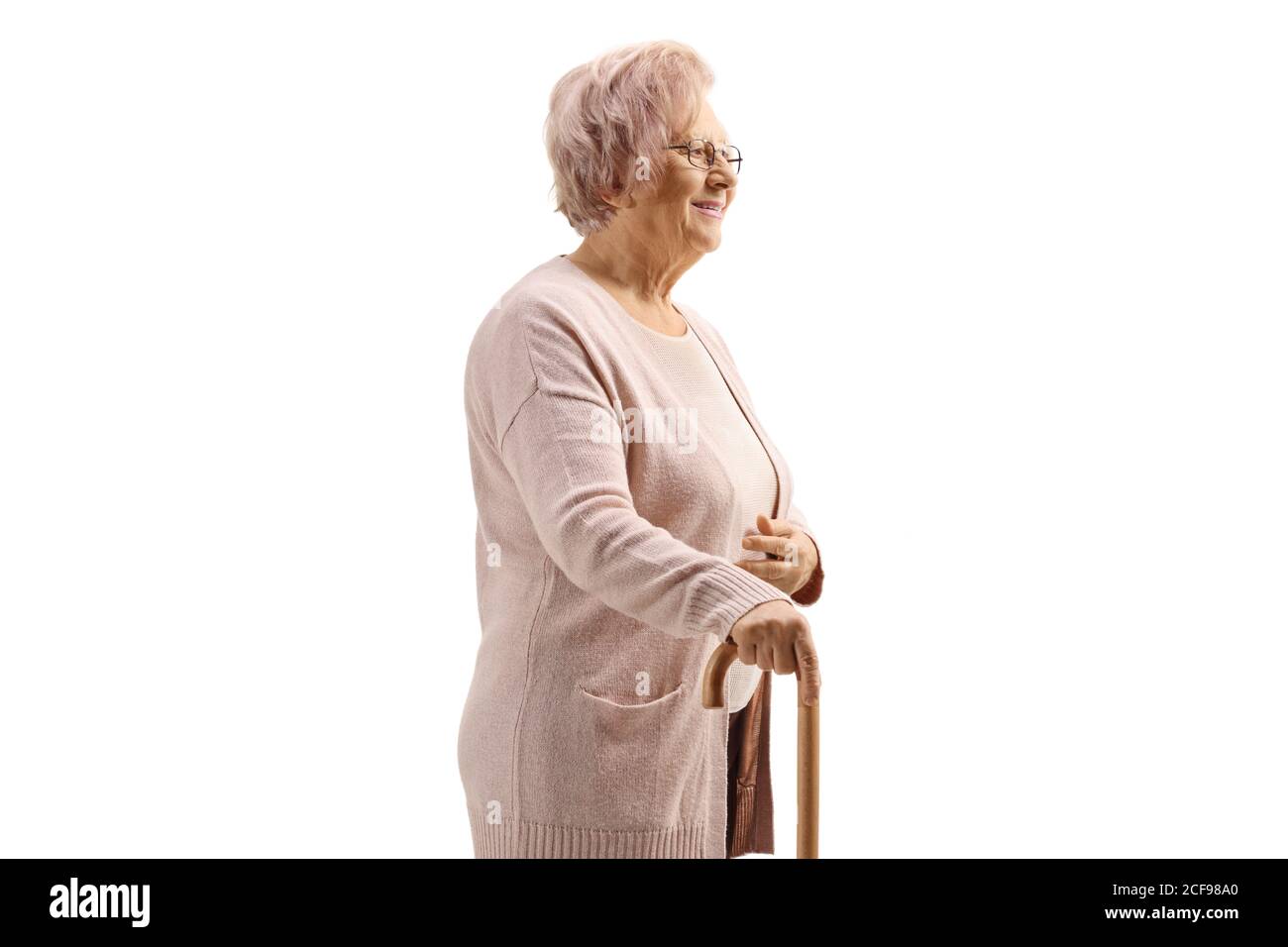 Elderly lady with a cane standing isolated on white background Stock ...