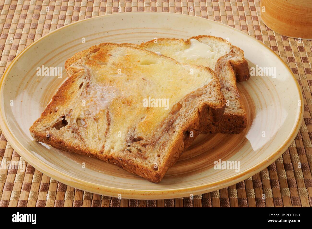 A plate of buttered cinnamon toast with coffee Stock Photo - Alamy