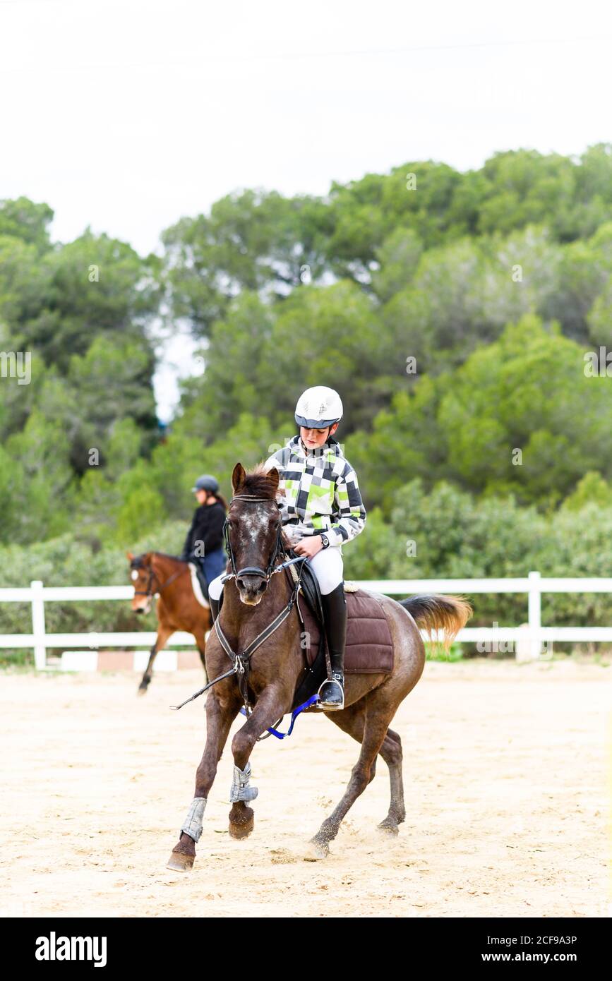 Teen boy riding horse hi-res stock photography and images - Alamy