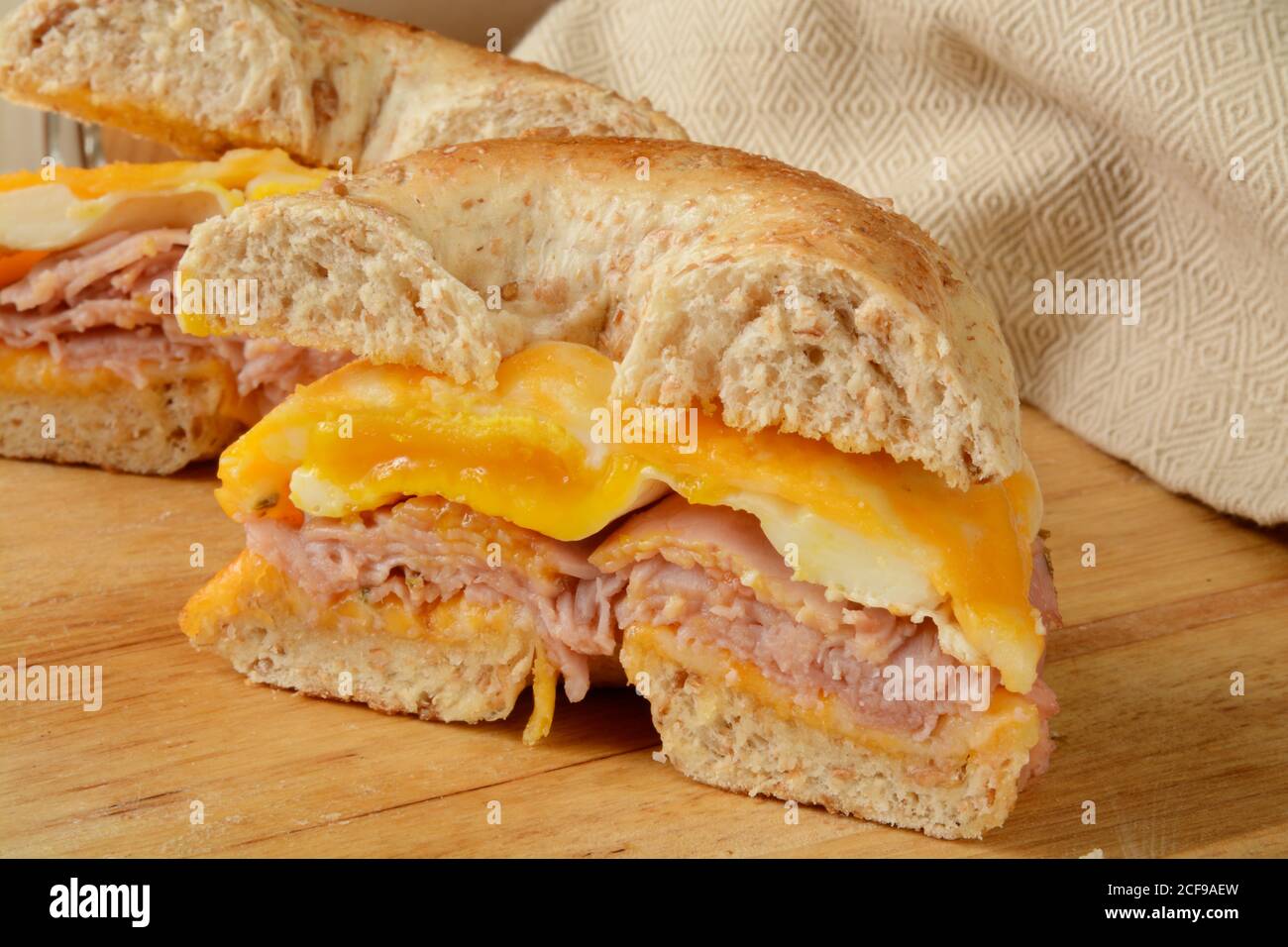 A ham, egg and cheese breakfast sandwich on a multi grain bagel Stock ...