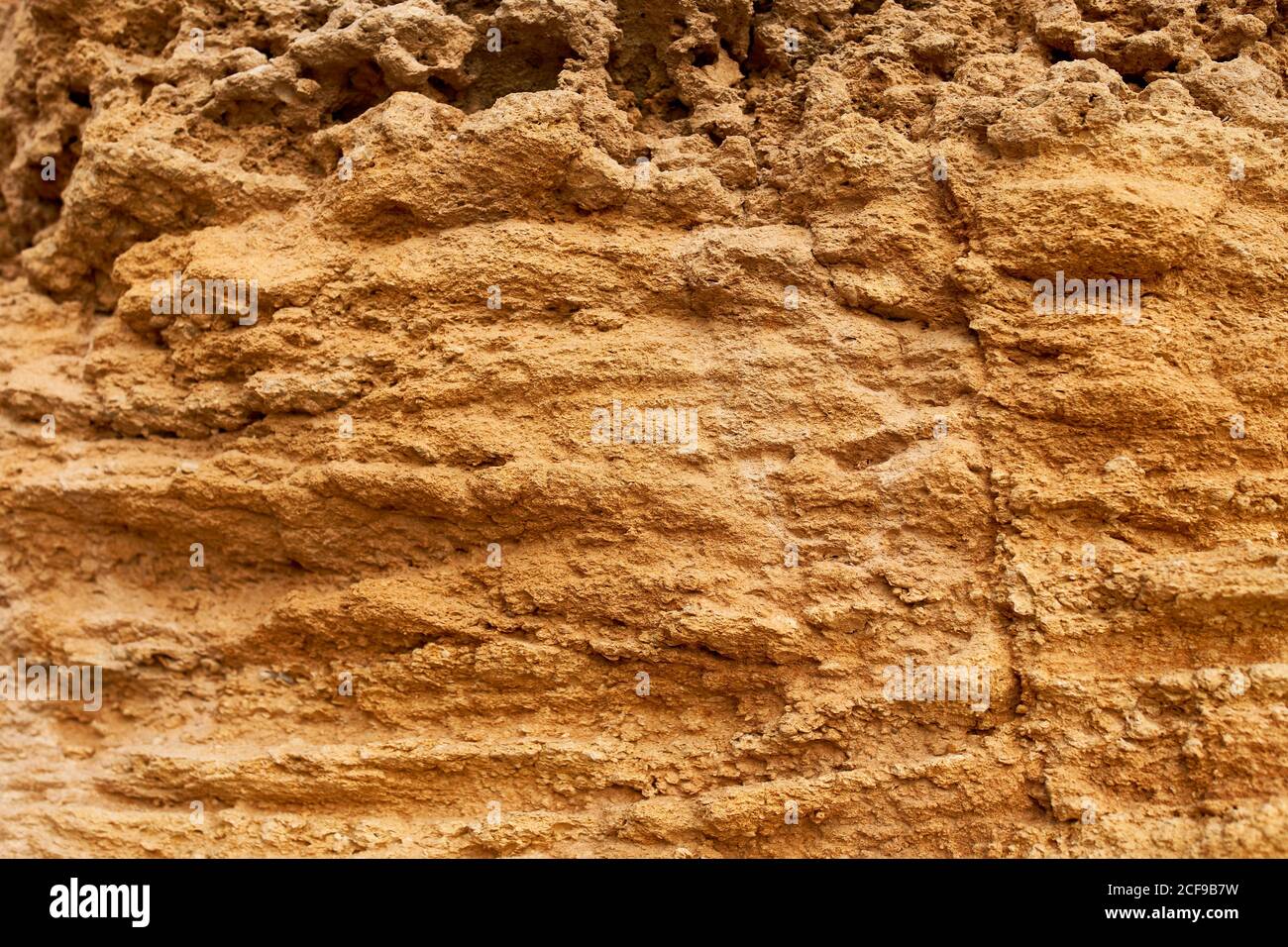 Yellow stone texture, close up Stock Photo - Alamy