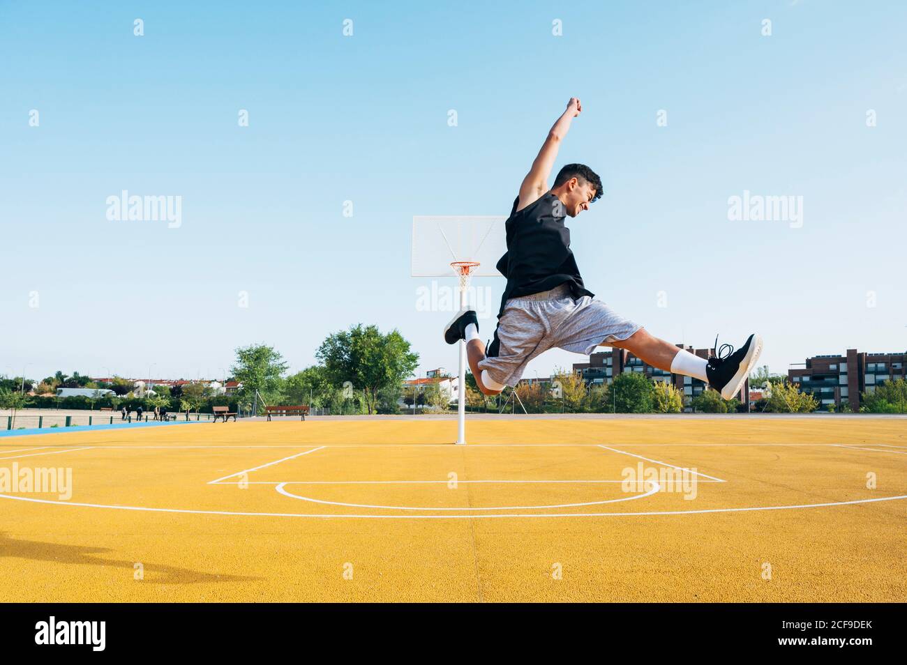 Man jumping happily hi-res stock photography and images - Alamy