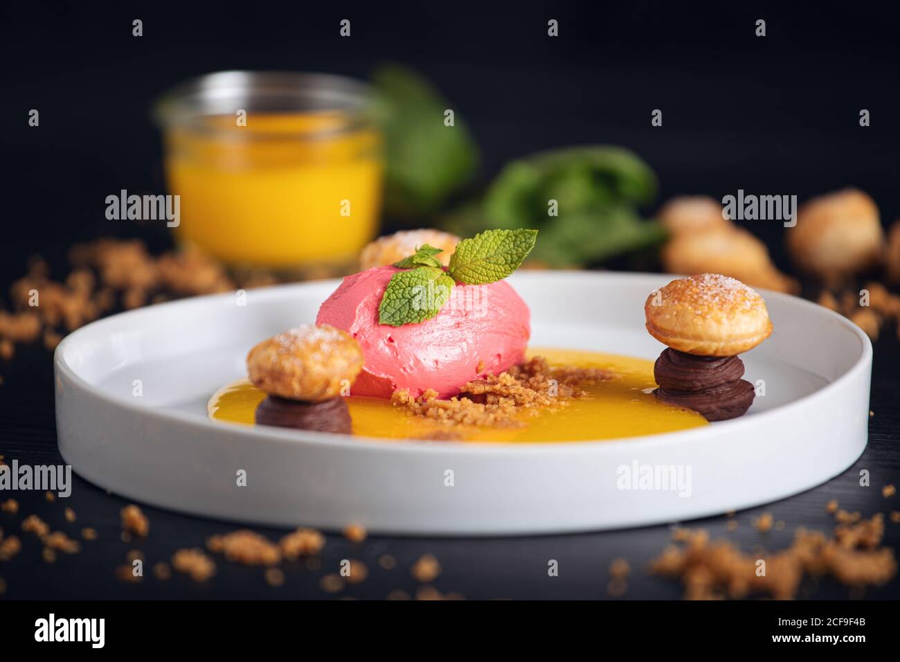 Raspberry ice cream with curable oranges chocolate and puff pastry ...