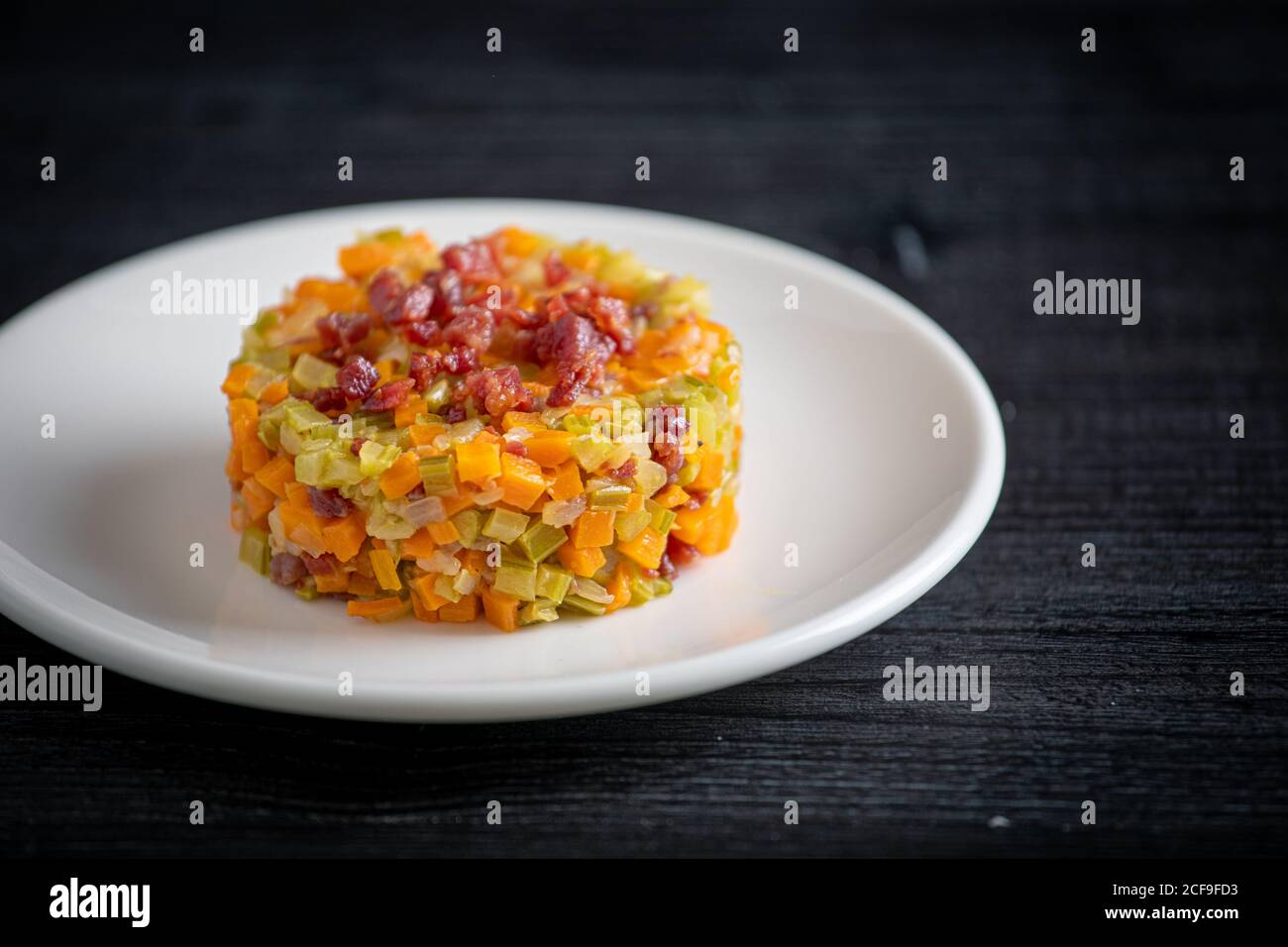 Matignon blanc in plate on decorated surface Stock Photo - Alamy