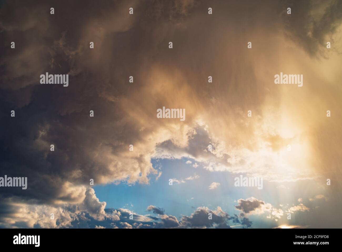 Dark storm clouds before the rain at sunset Stock Photo - Alamy