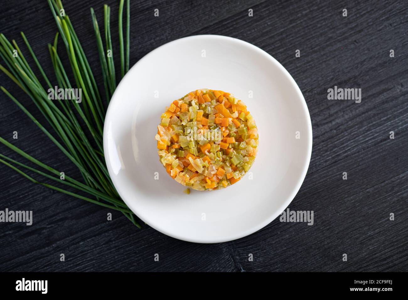 Matignon blanc in plate on decorated surface Stock Photo - Alamy