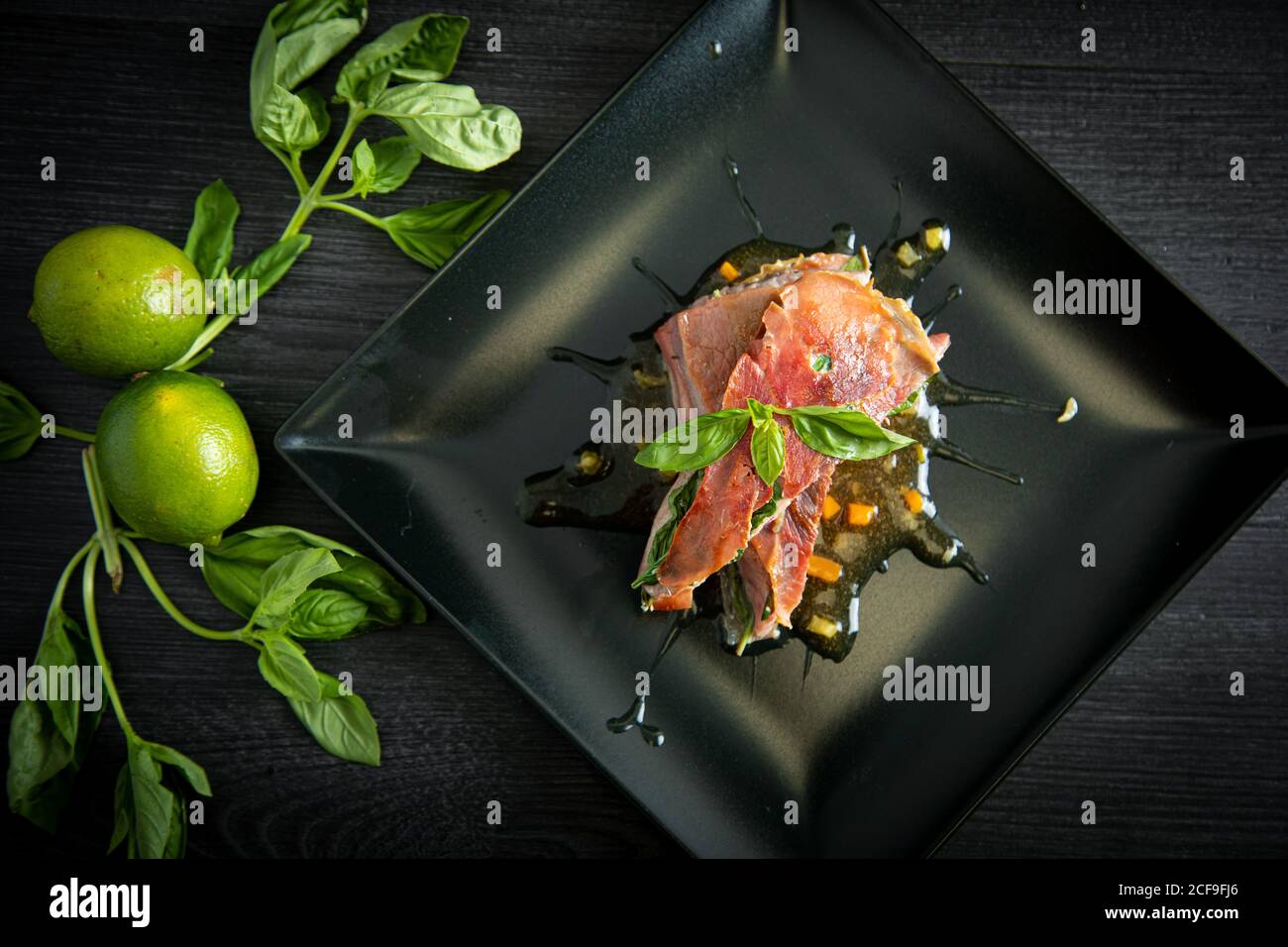 Bluefin tuna with basil ham and chicken demiglace Stock Photo - Alamy