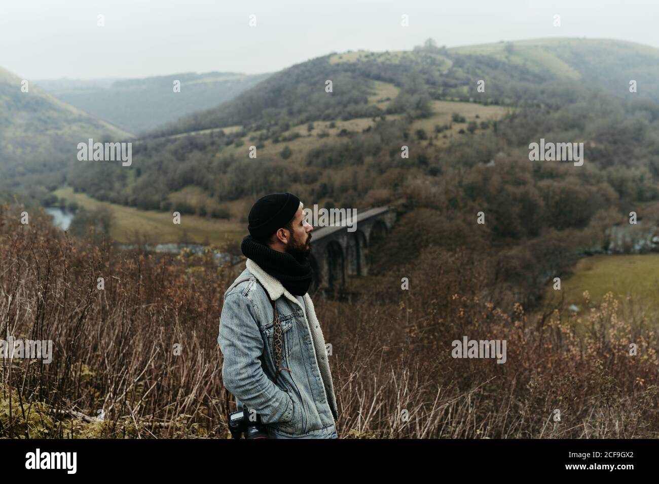 Side view of touristic photographer exploring place and enjoying views ...
