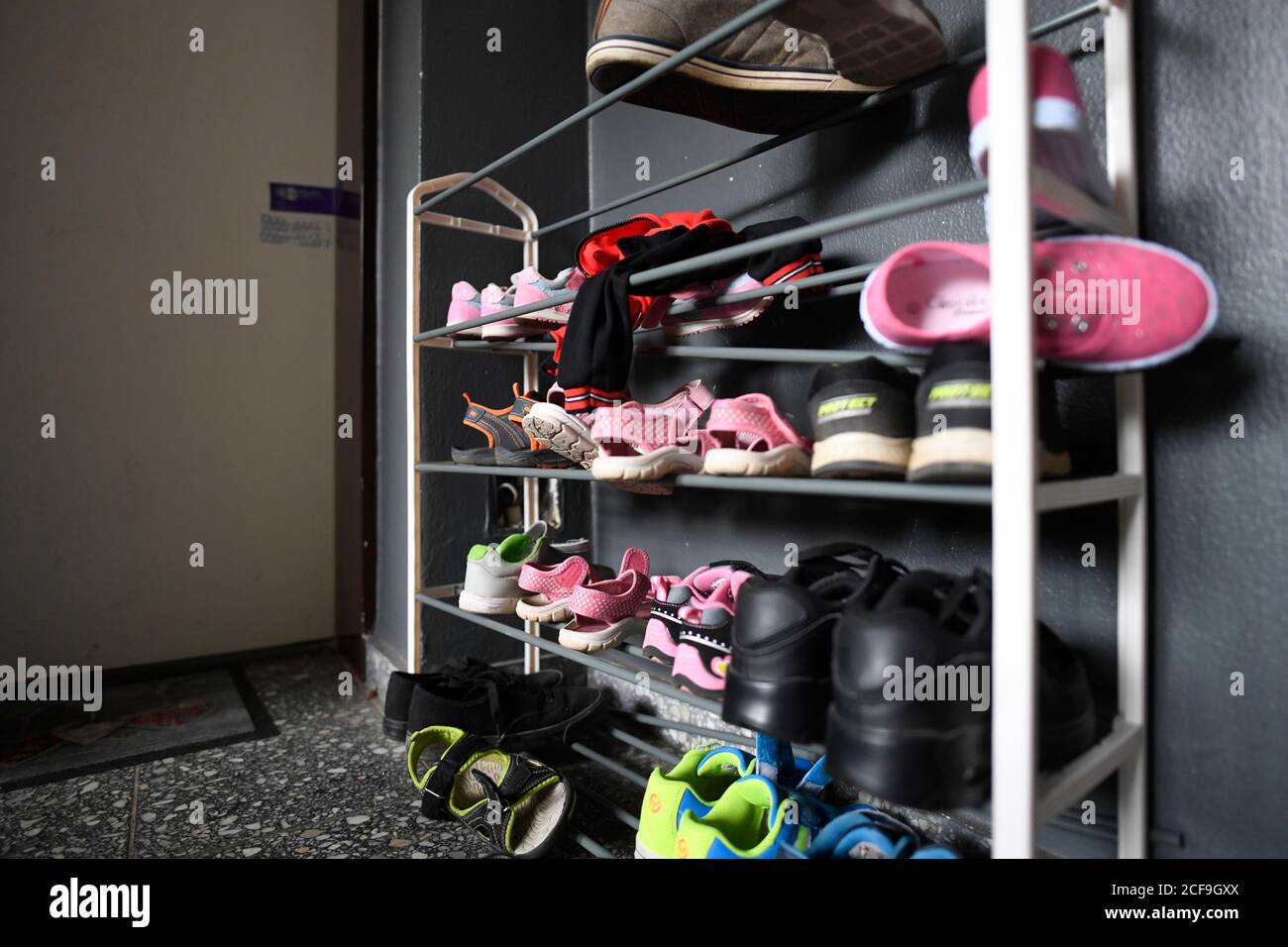 Children shoe rack hi-res stock photography and images - Alamy