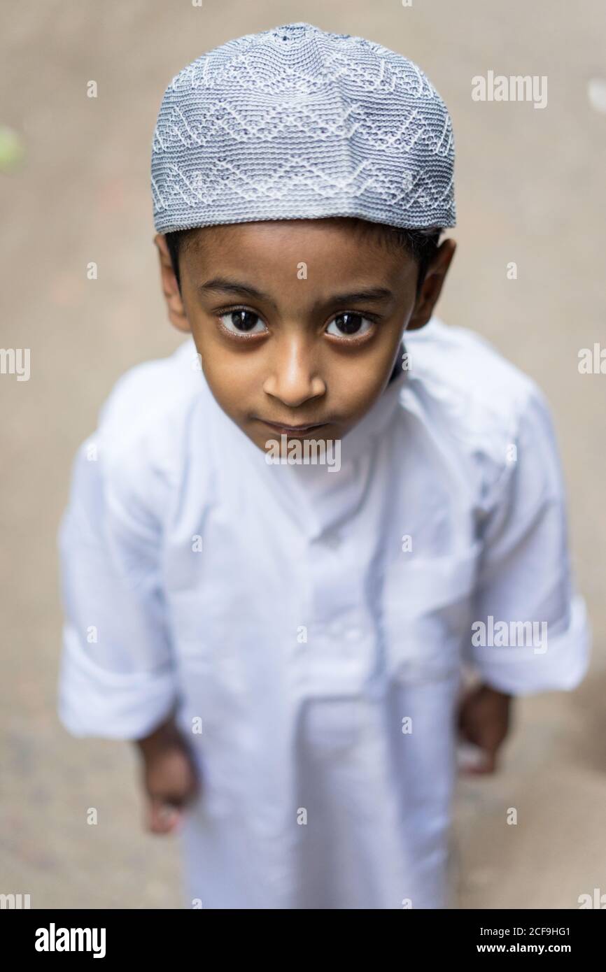 Bangladesh - January, 25 2019: From above little ethnic boy in ...