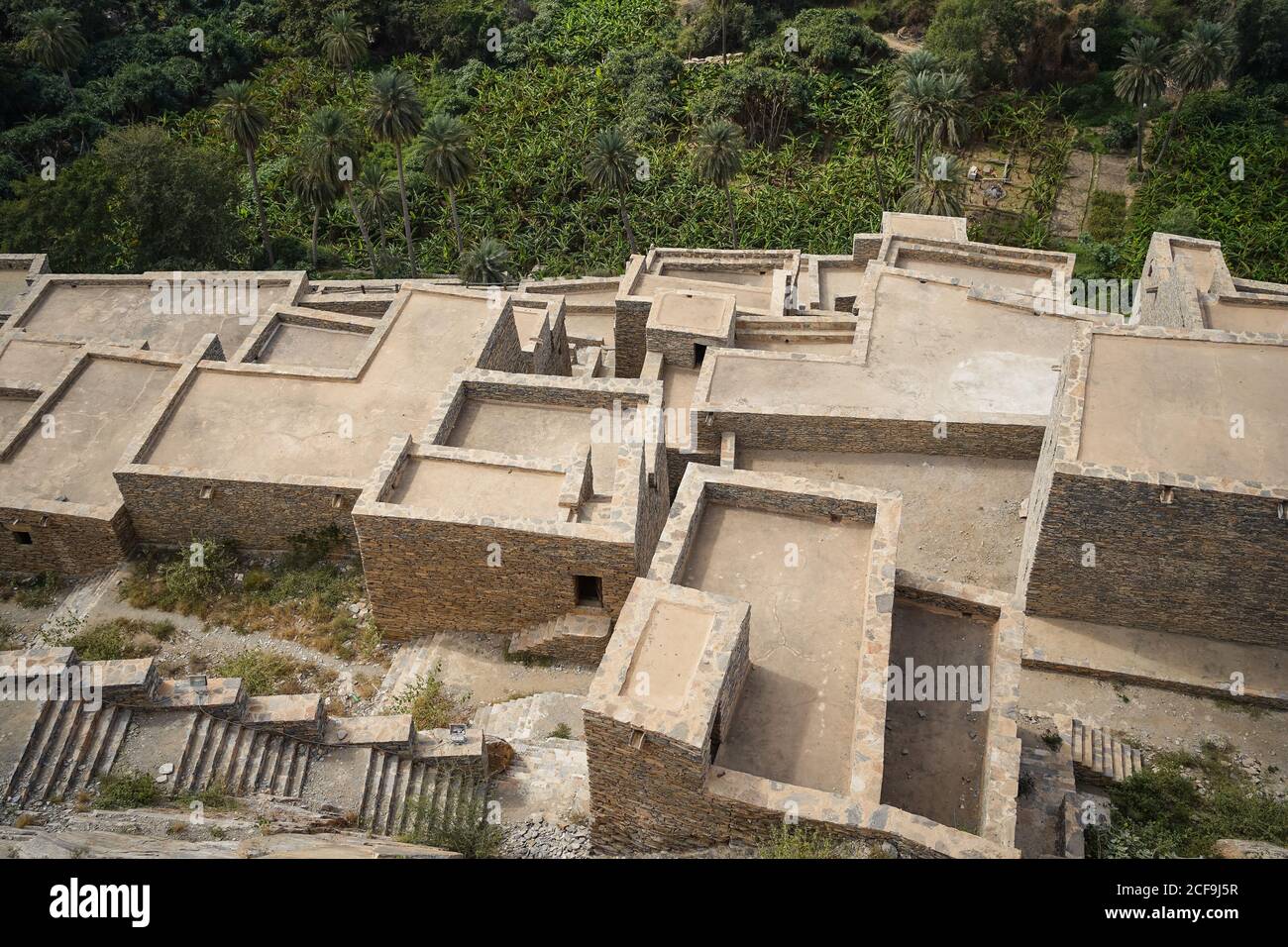 From above of distant roofs of stone aged buildings of ancient Marble ...