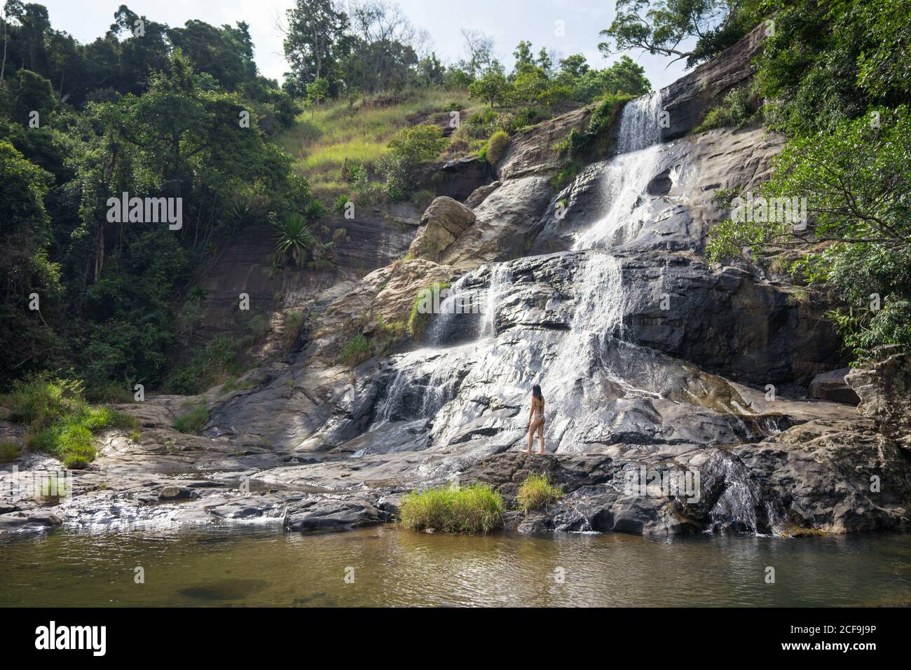 Strong waterfall falls from mountain hi-res stock photography and ...